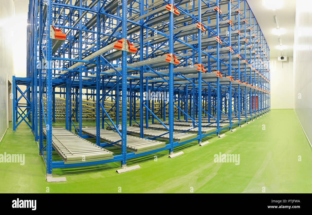 Empty shelving system in new distribution warehouse Stock Photo - Alamy