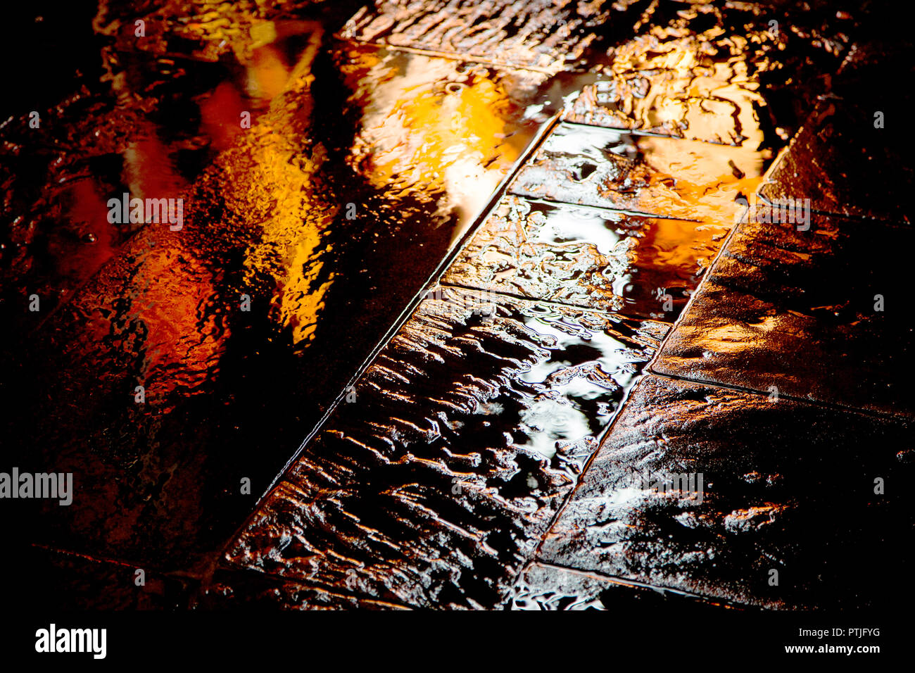 Reflection of city lights in the rain Stock Photo - Alamy