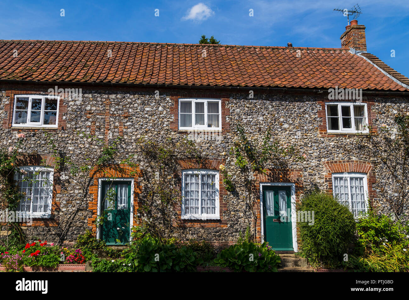 Pretty stone buildings in Castle Acre Stock Photo - Alamy