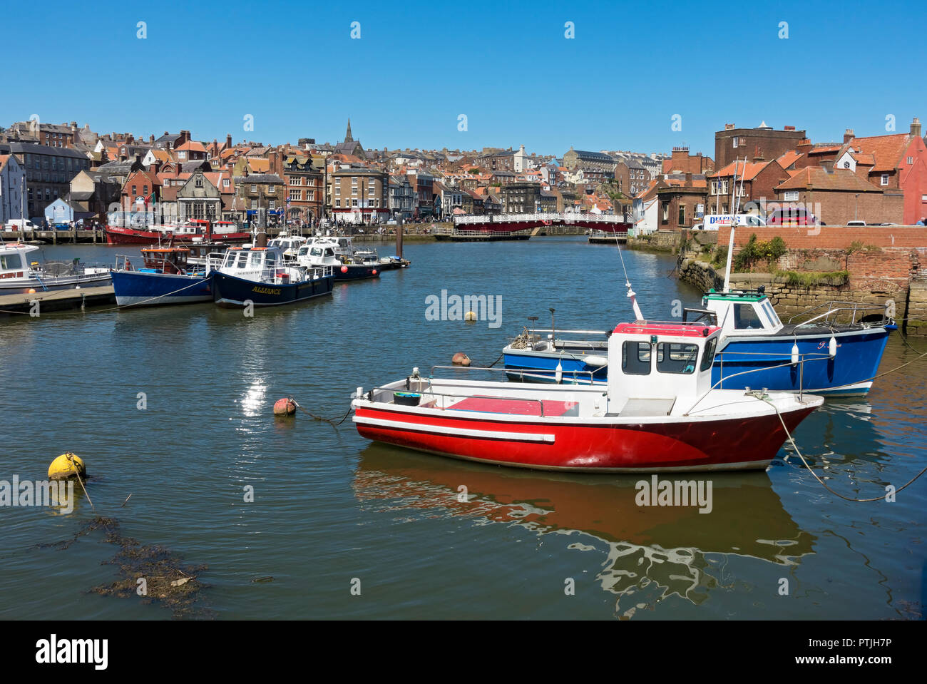 Fishing boats moored in Whitby harbour Stock Photo - Alamy