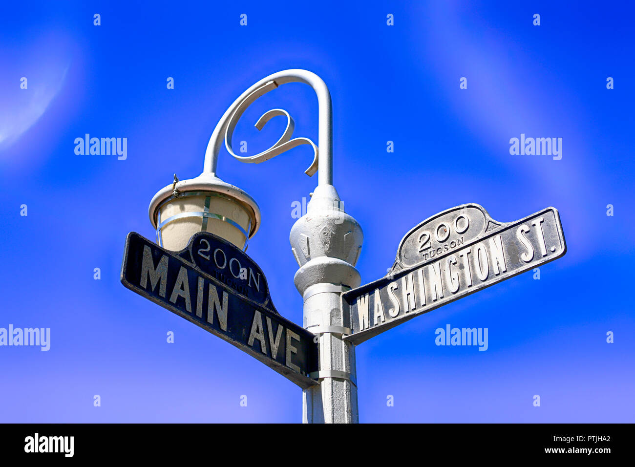 Old fashioned signpost on the corner of Main Ave and Washington St in ...