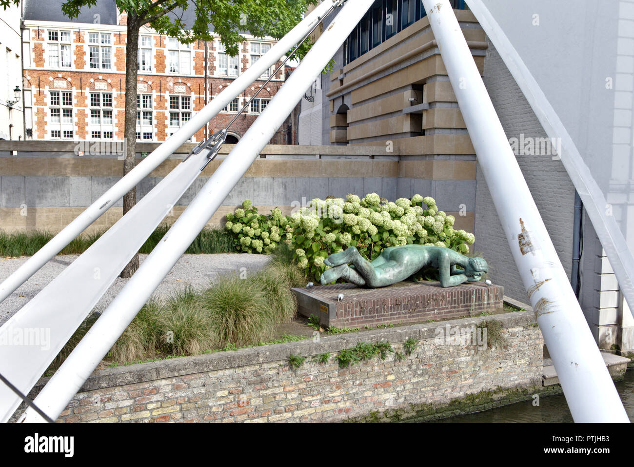 Sculpture of horizontal woman seen through the Brug Footbridge Stock ...