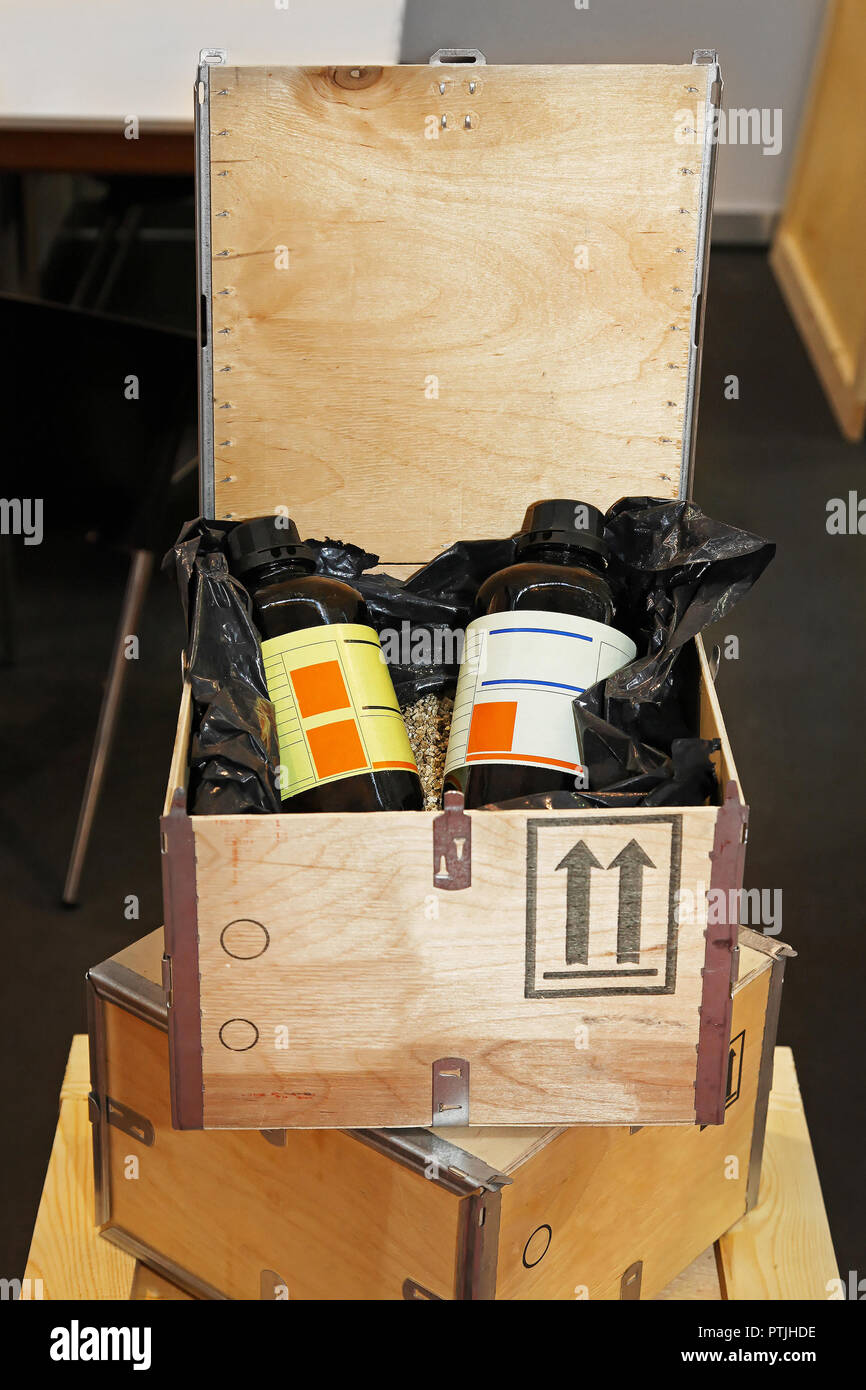 Glass bottles with toxic chemicals in transport box Stock Photo - Alamy