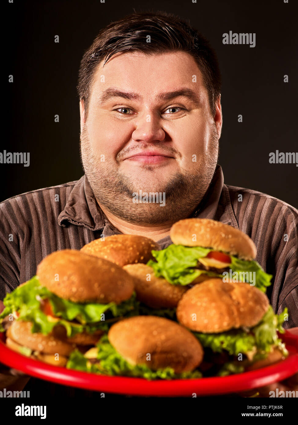 Hamburger eating fast food contest. Fat man eating fast food Stock ...