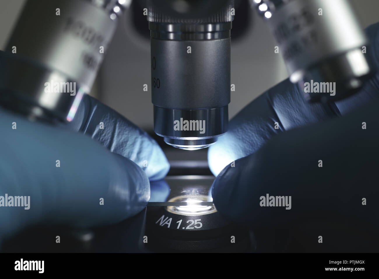Scientist hands with microscope Stock Photo - Alamy