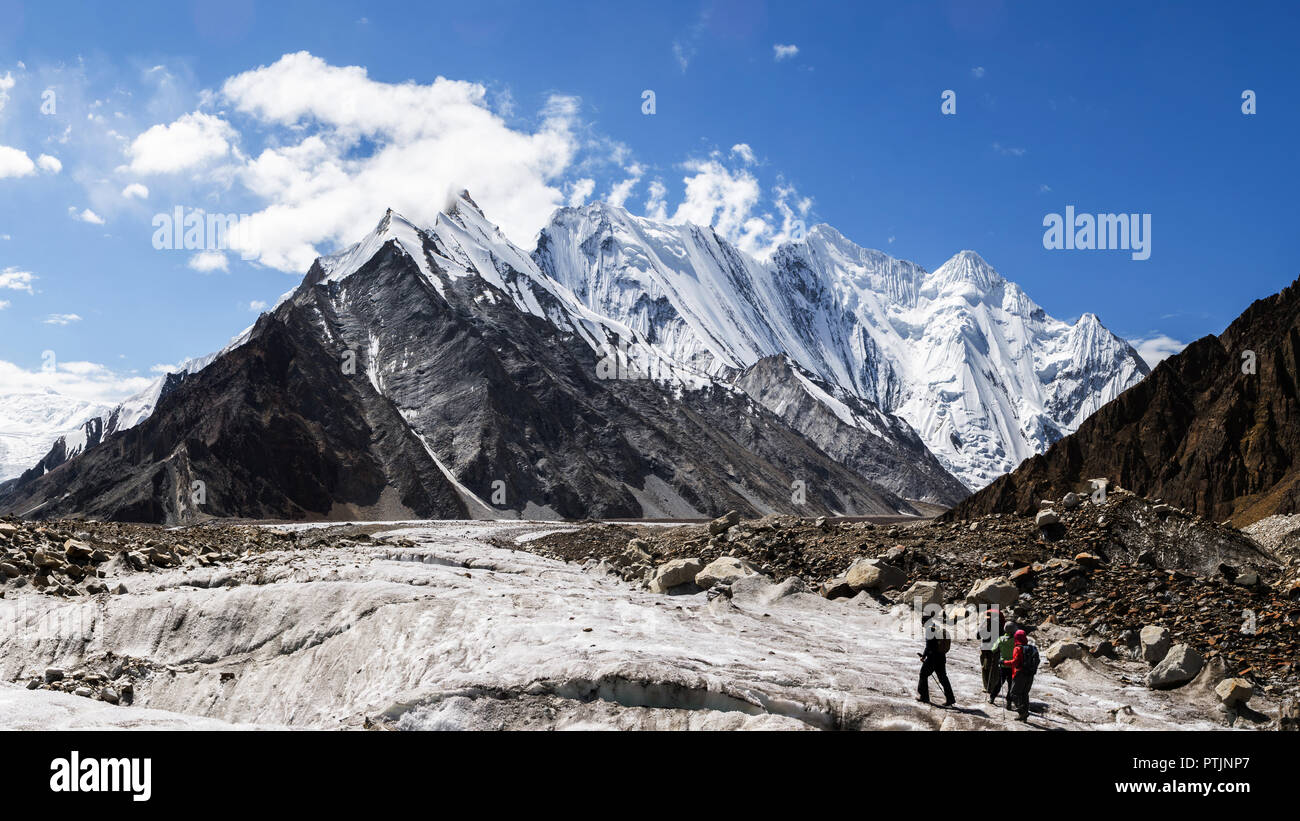 Hikers finding their way from Upper Baltoro glacier to Vigne glacier ...
