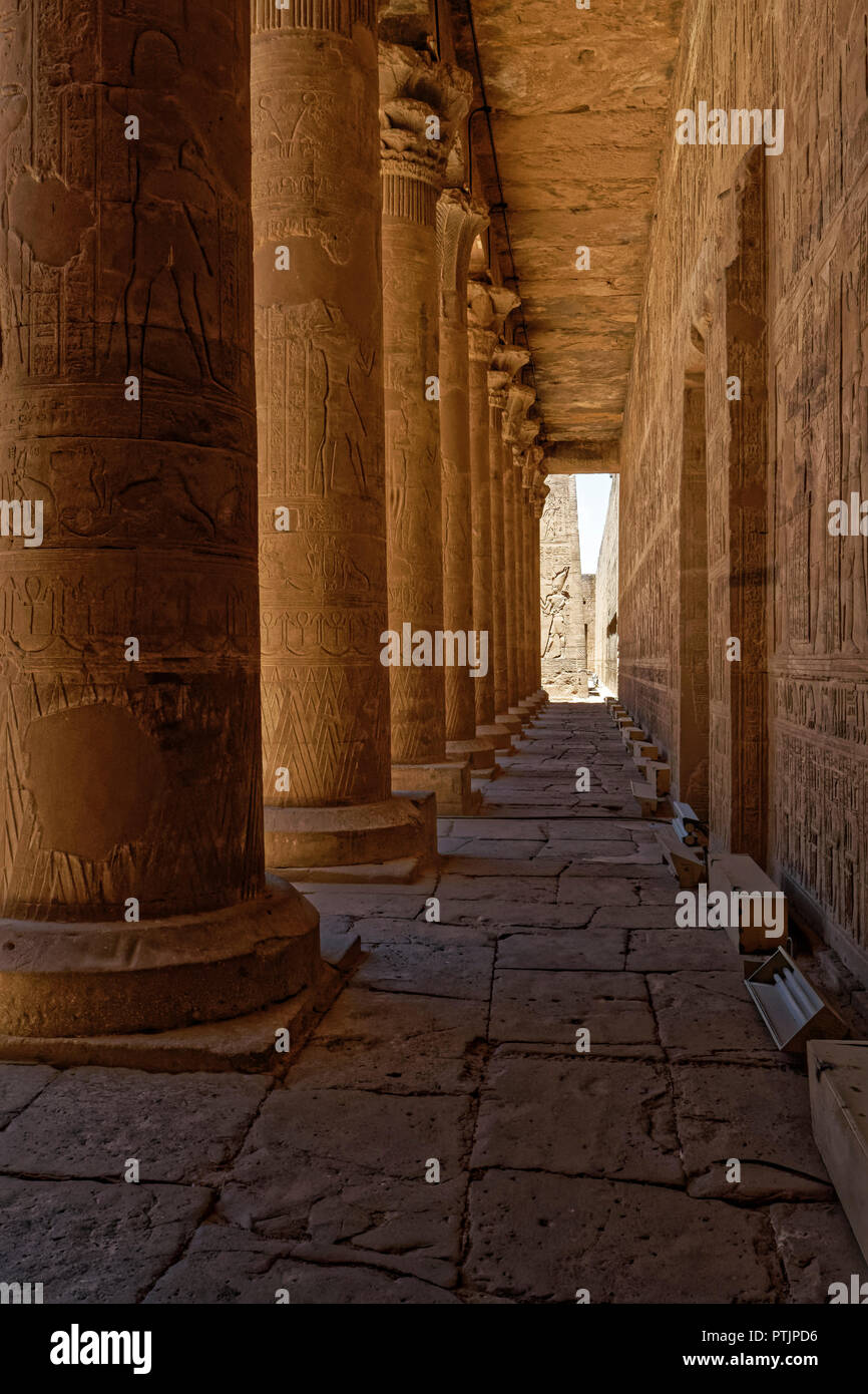 The large courtyard at Edfu Temple has two rows of columns on its sides ...