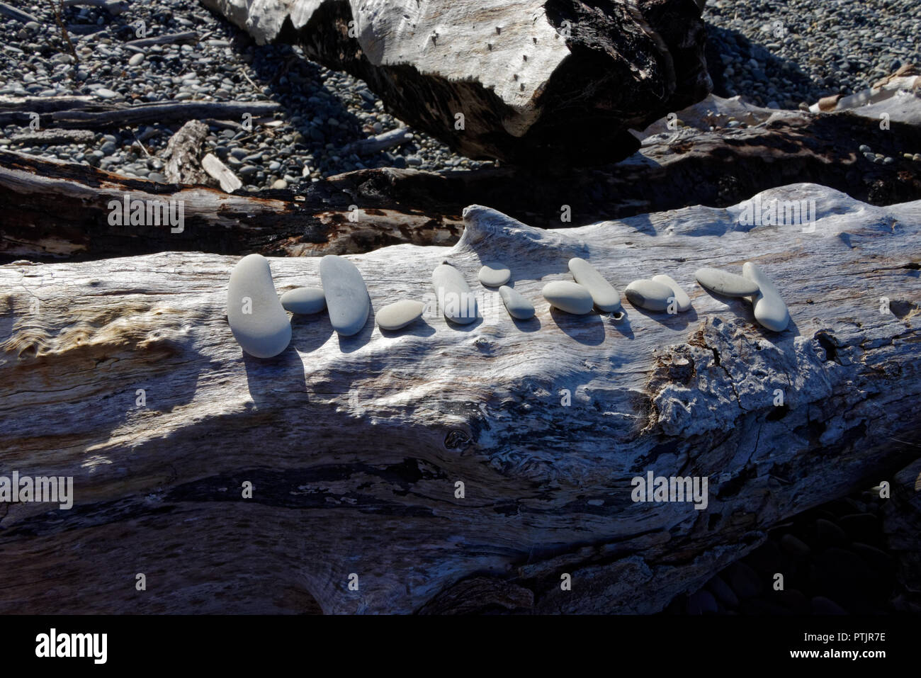 Beach frivolity, holiday written in pebbles Stock Photo - Alamy