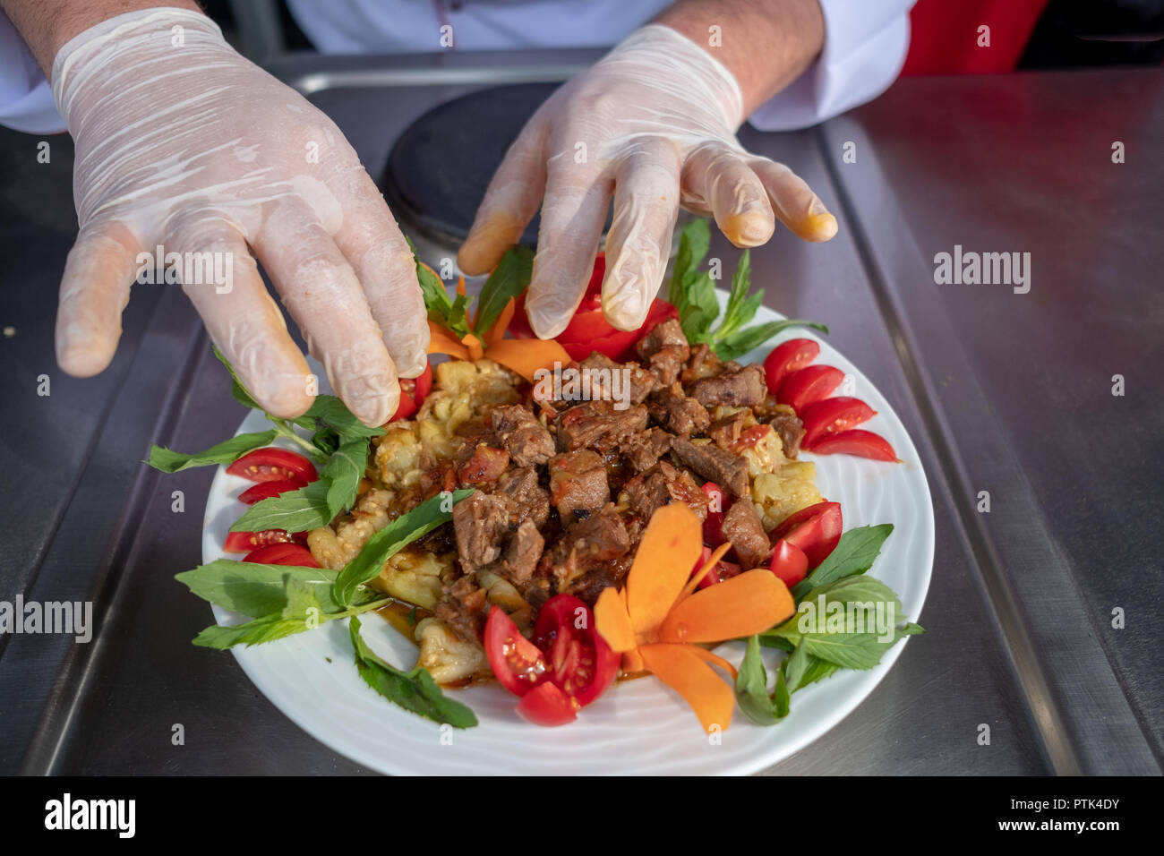 Chef in hotel or restaurant kitchen cooking only hands Stock Photo - Alamy