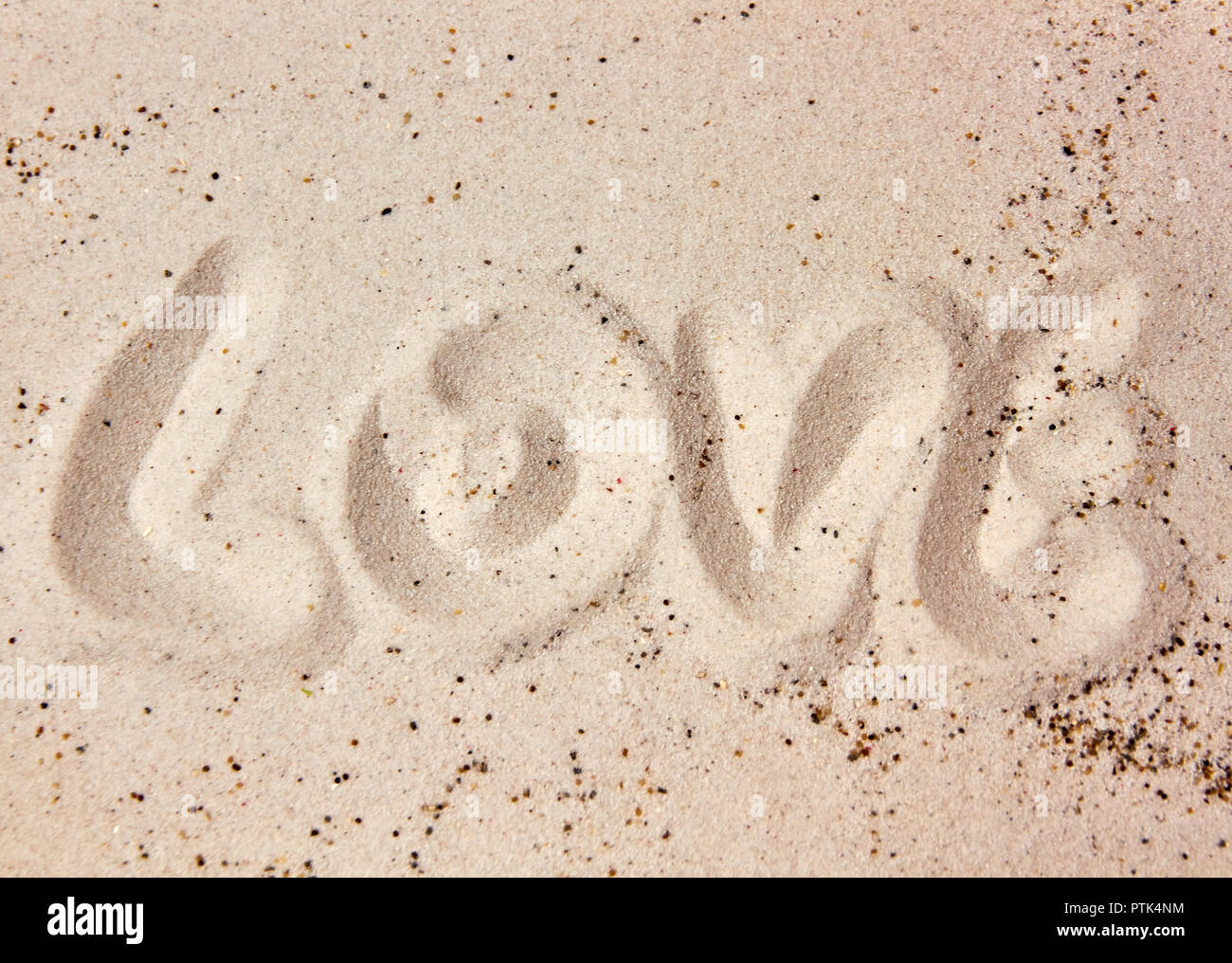 Love message in the sand Stock Photo - Alamy