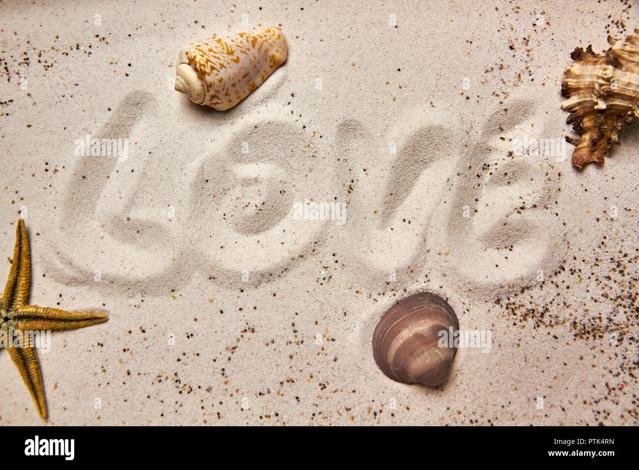 Love message in the sand Stock Photo - Alamy