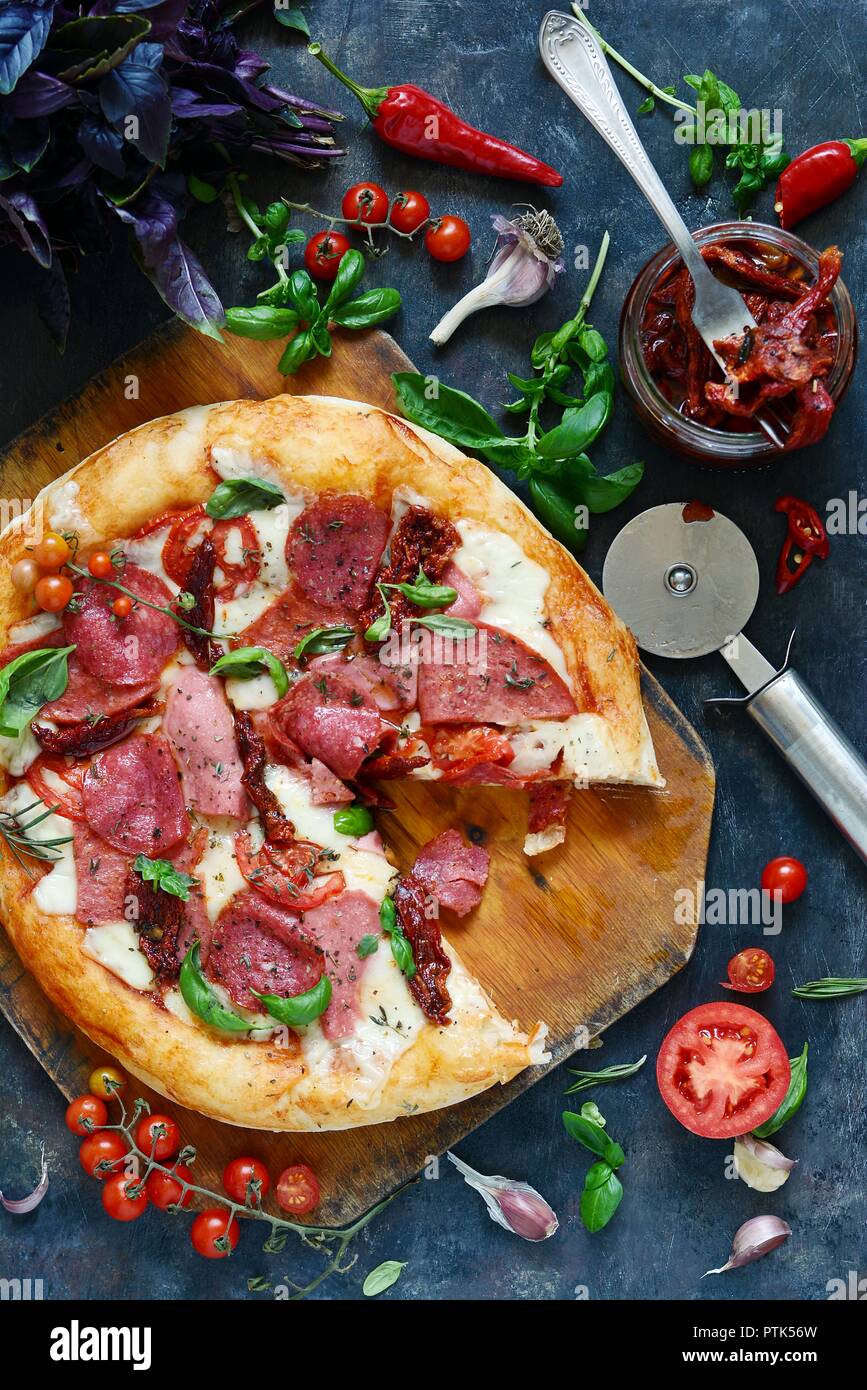 Traditional Fresh Italian pizza with dried salami tomatoes mozzarella ...