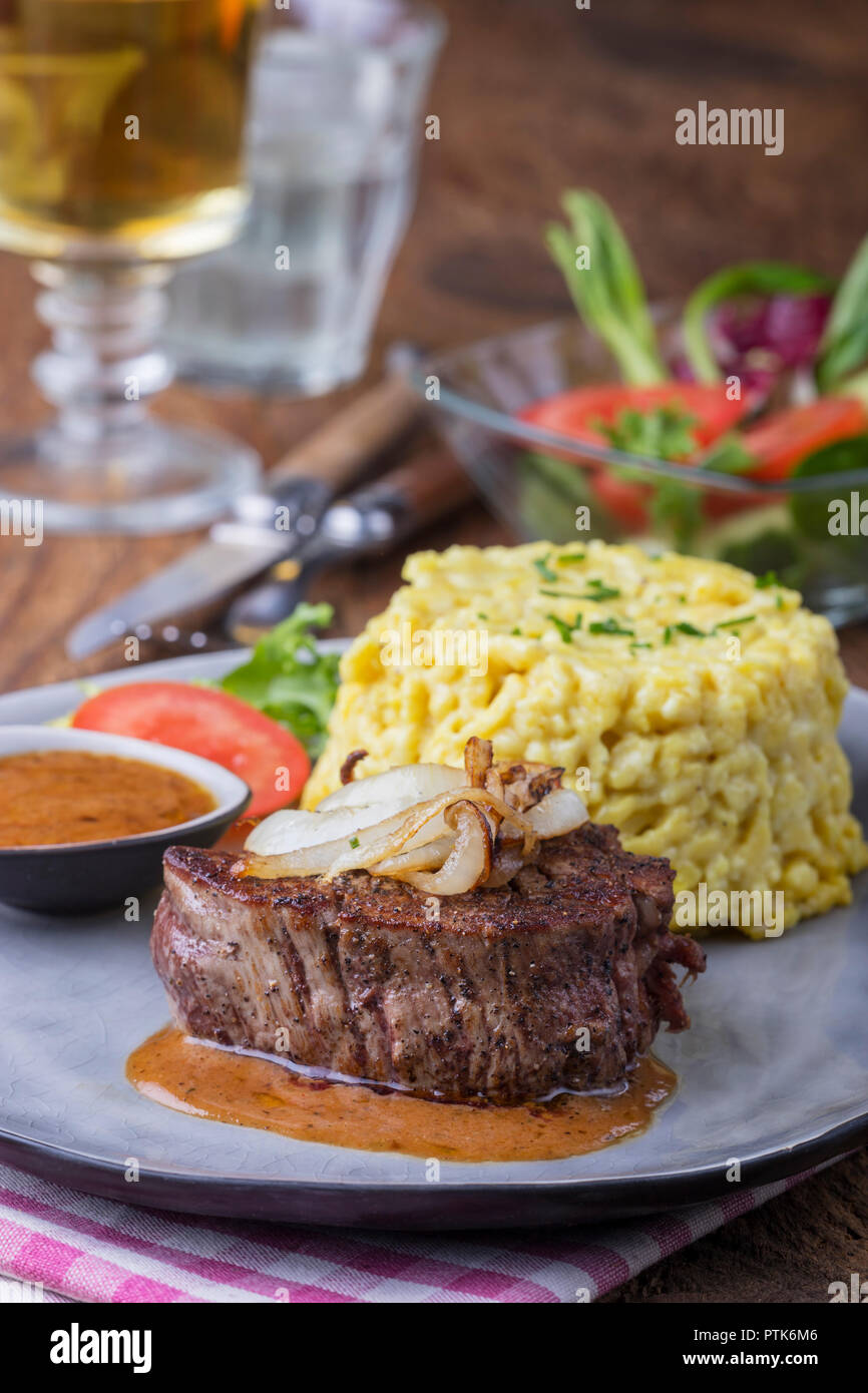 austrian onion steak with spaetzle Stock Photo - Alamy