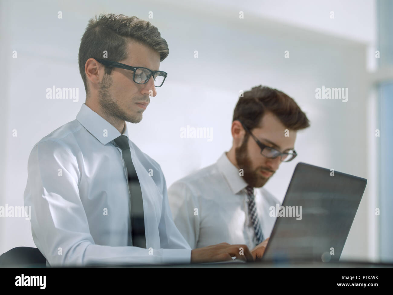 Serious office coworkers solving corporate hi-res stock photography and ...