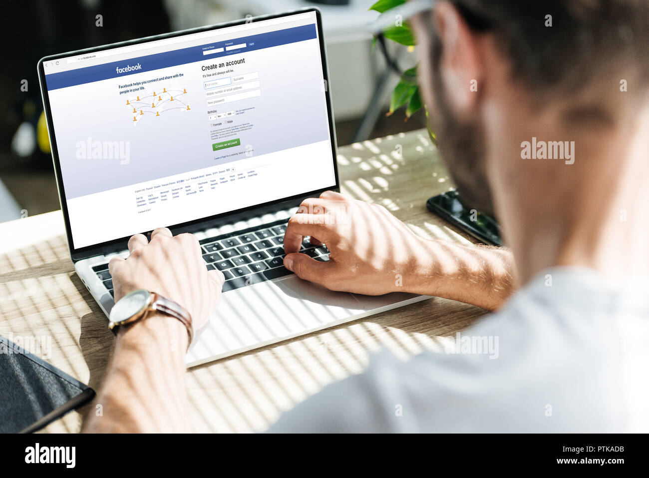 Person using facebook man hi-res stock photography and images - Alamy