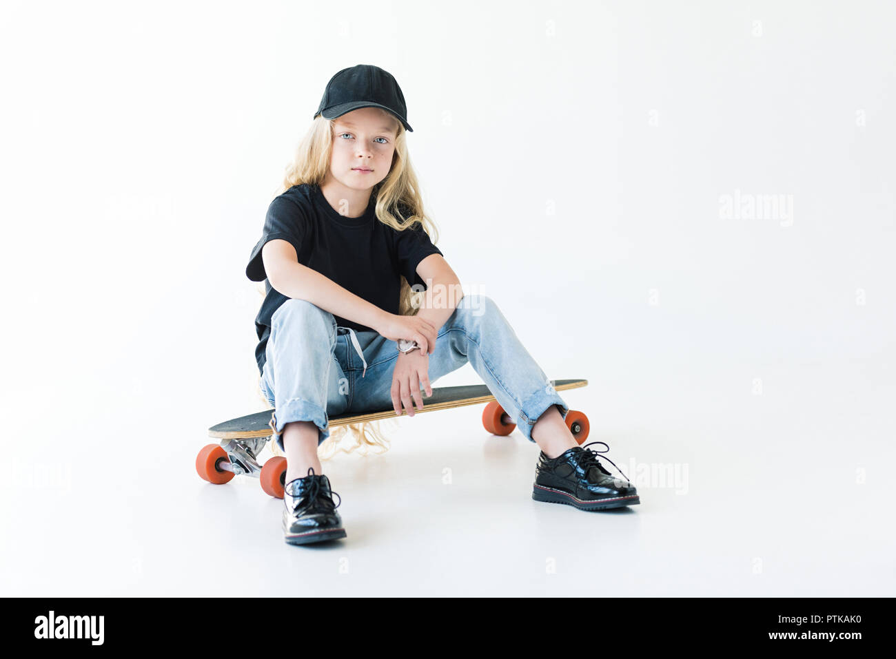 Female child sitting on hi-res stock photography and images - Alamy