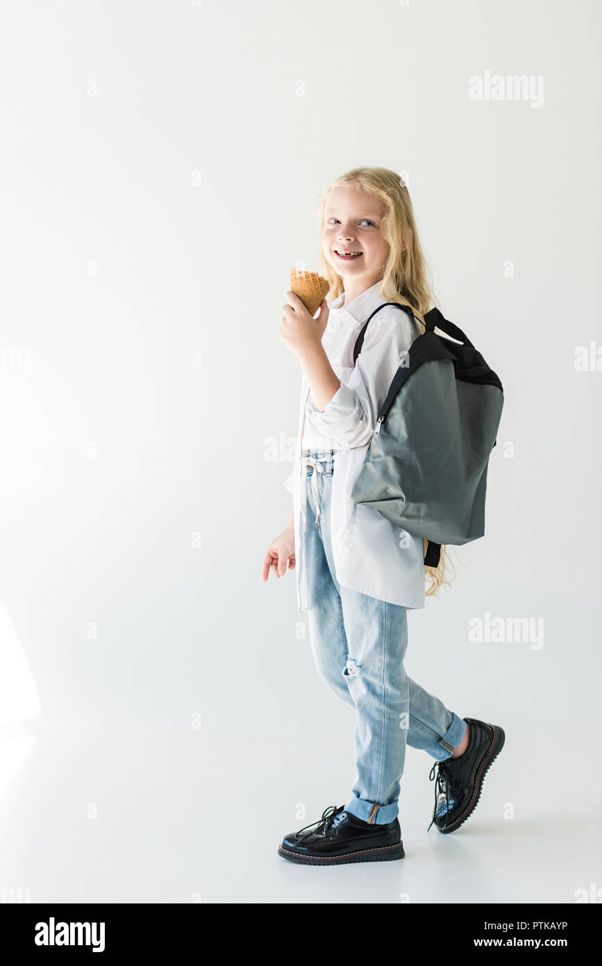 Adorable child backpack eating hi-res stock photography and images - Alamy