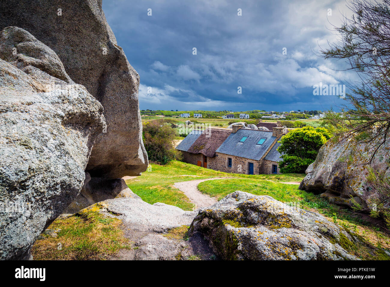 House between the rocks in Meneham village, Kerlouan, Finistere ...