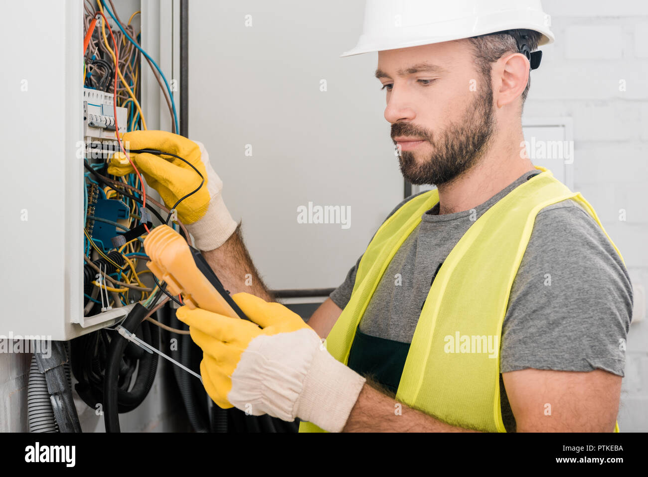 Electrician inspecting equipment hi-res stock photography and images ...