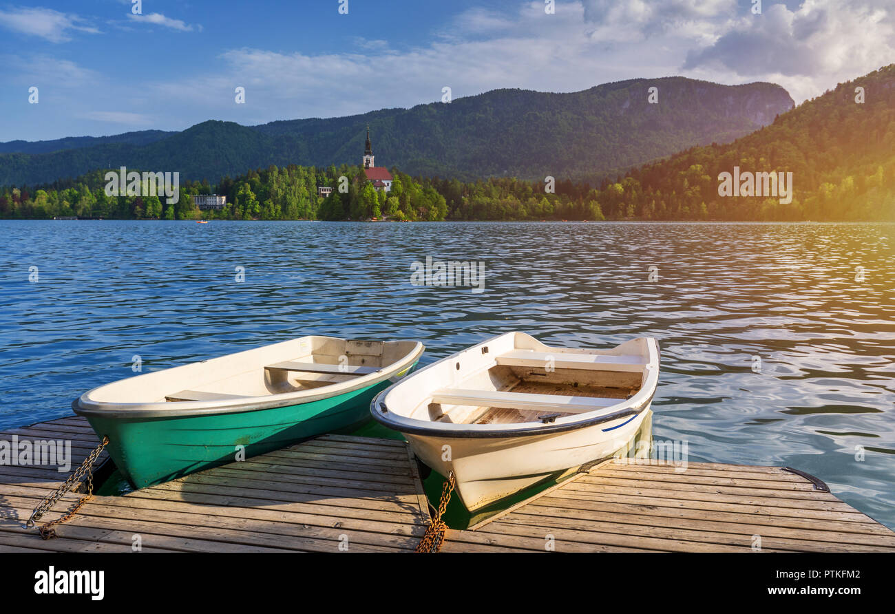 Iconic Bled scenery. Boats at lake Bled, Slovenia, Europe. Wooden boats ...