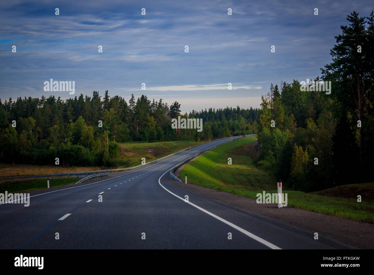 Russian roads in Karelia. Travel by road. Asphalt road. Smooth road car ...