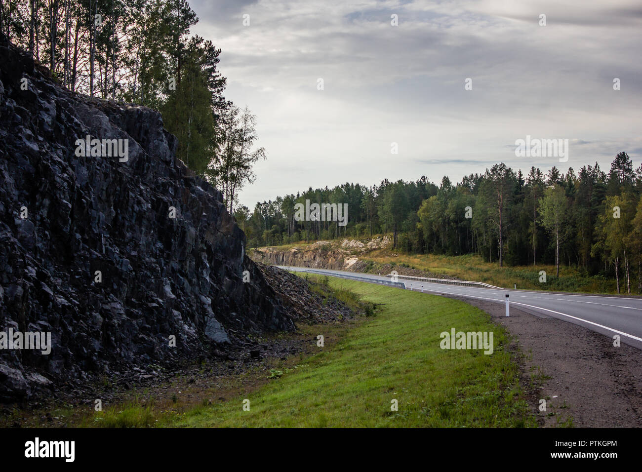 Russian roads in Karelia. Travel by road. Asphalt road. Smooth road car ...