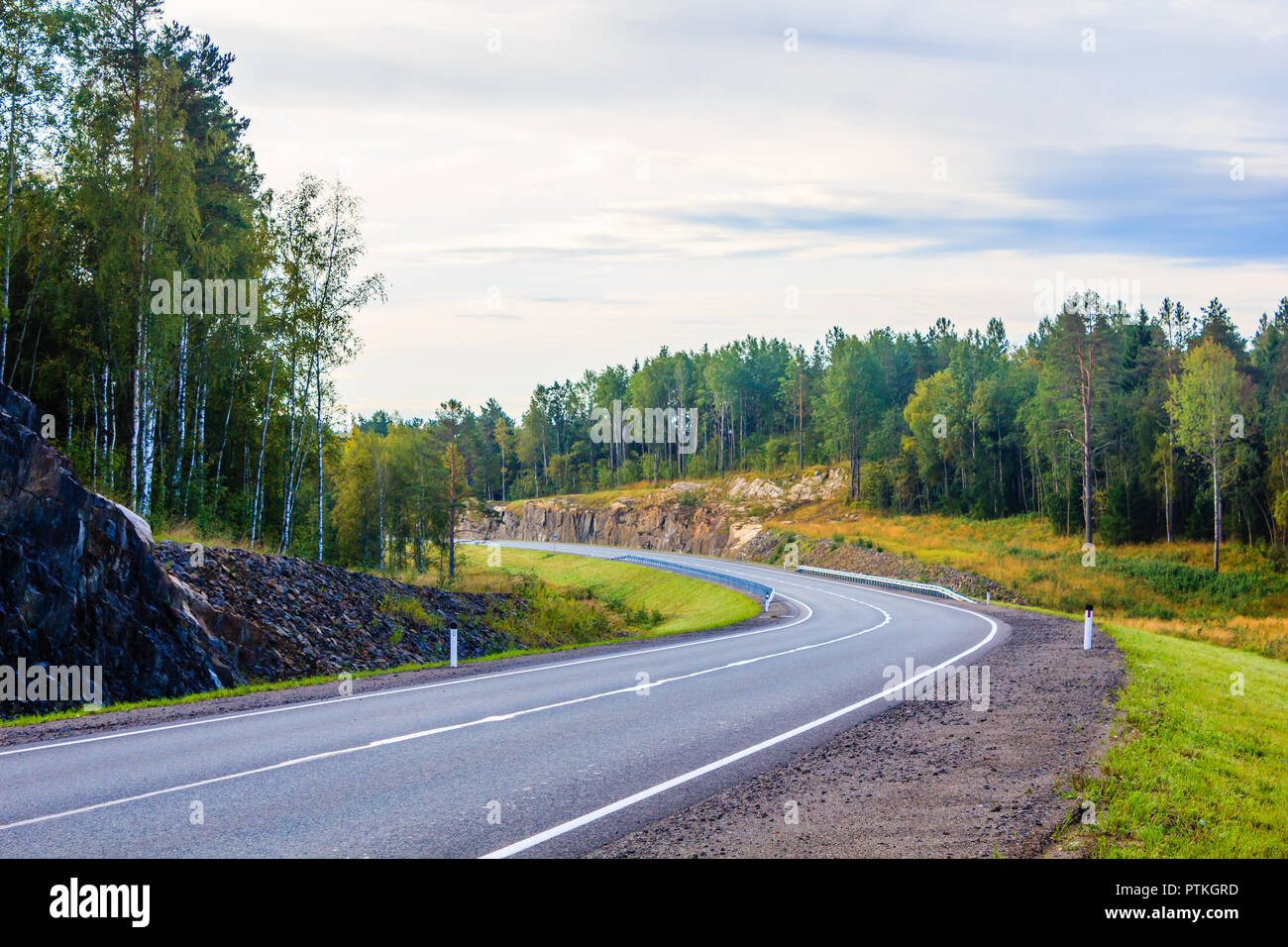 Russian roads in Karelia. Travel by road. Asphalt road. Smooth road car ...