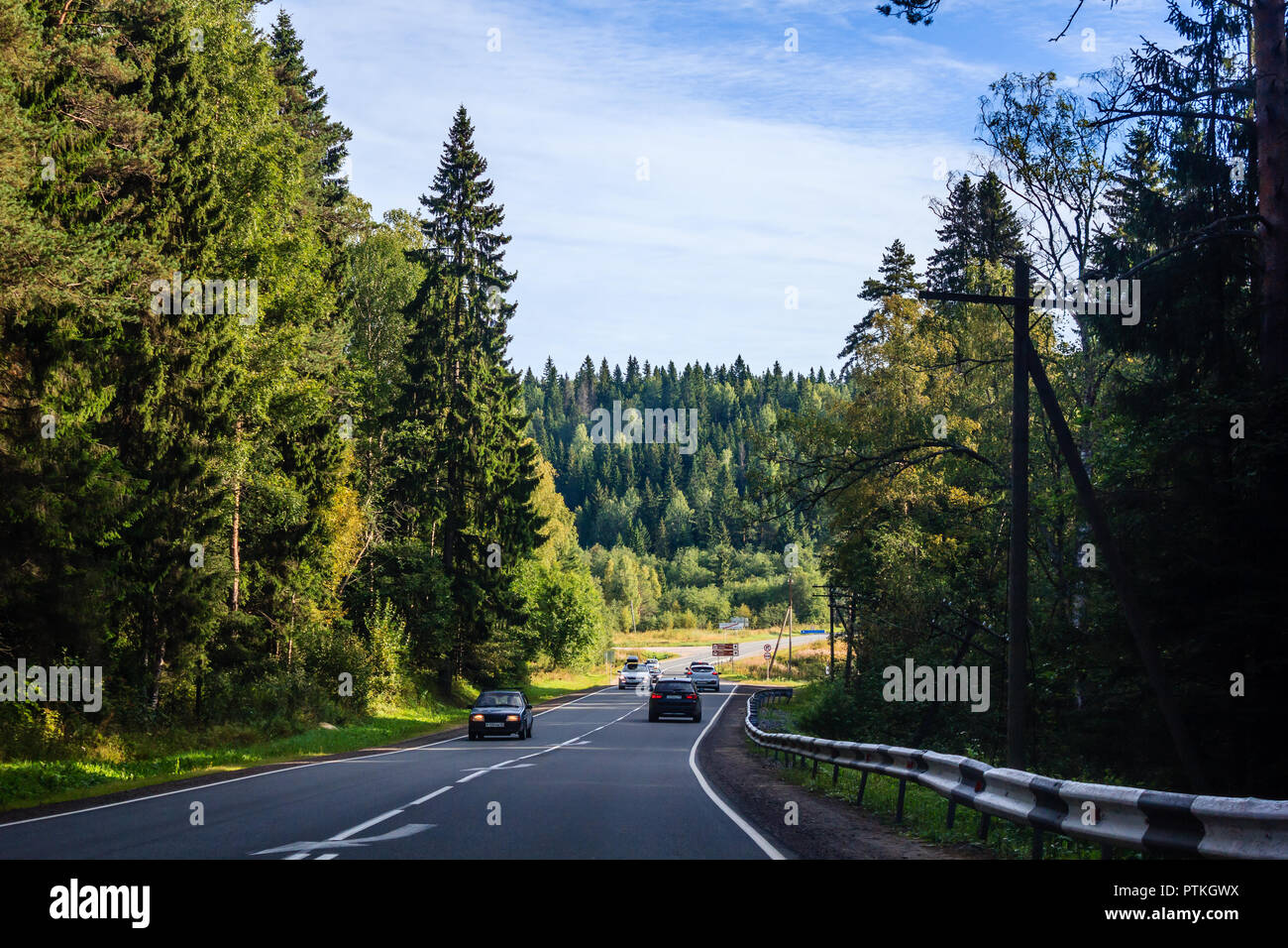 Russian roads in Karelia. Travel by road. Asphalt road. Smooth road car ...