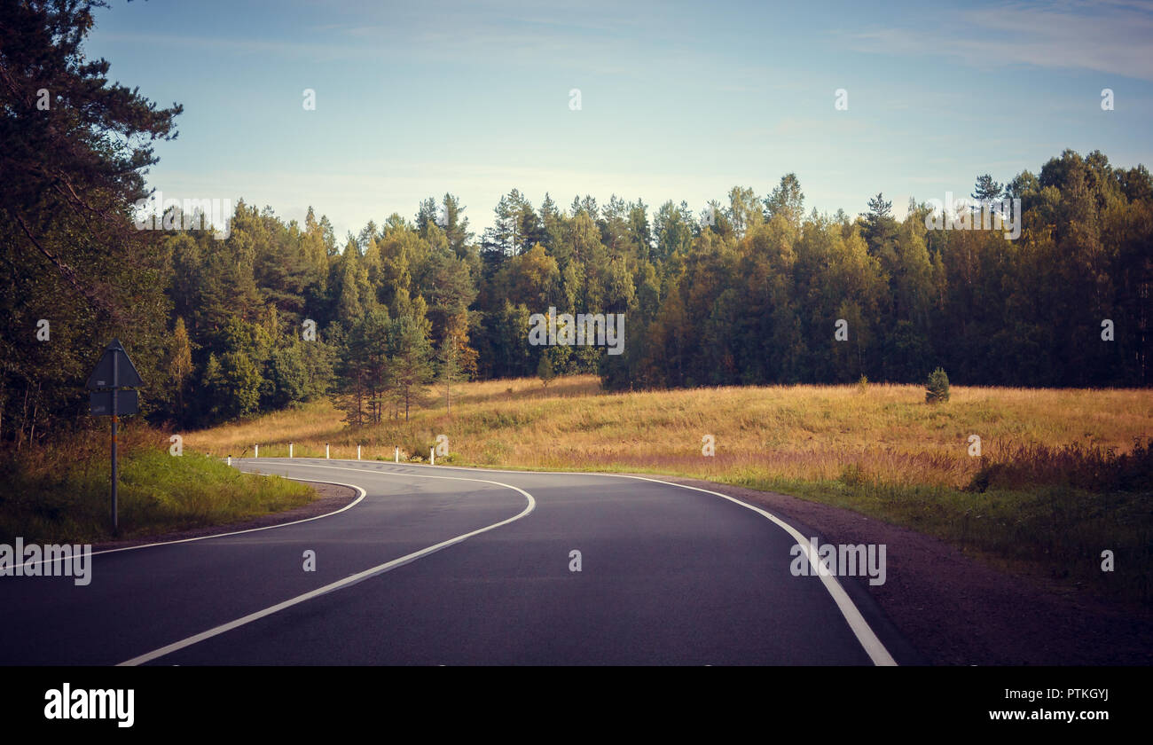 Russian roads in Karelia. Travel by road. Asphalt road. Smooth road car ...
