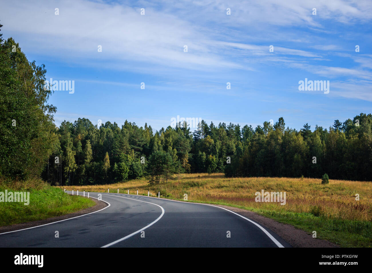 Russian roads in Karelia. Travel by road. Asphalt road. Smooth road car ...