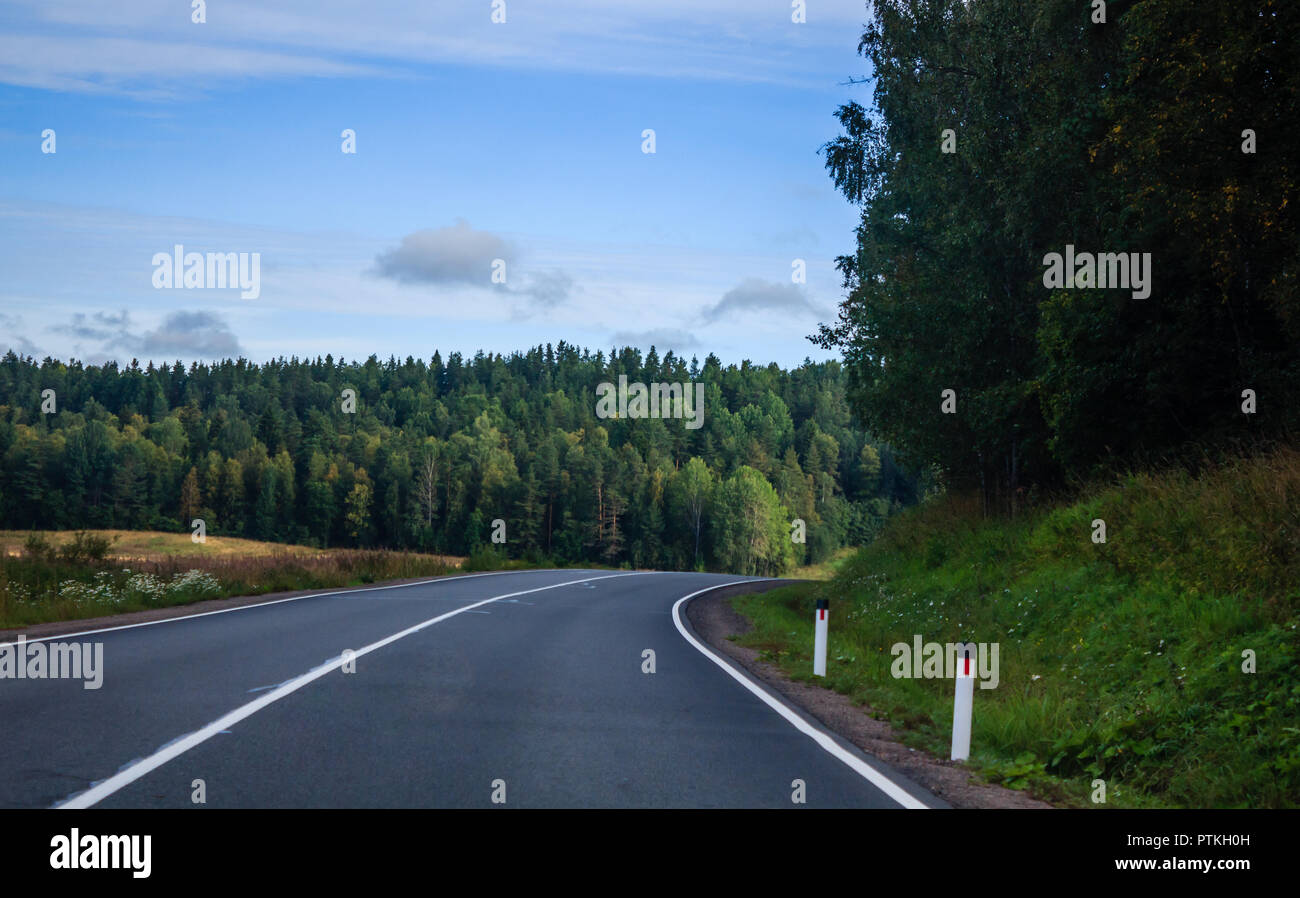Russian roads in Karelia. Travel by road. Asphalt road. Smooth road car ...