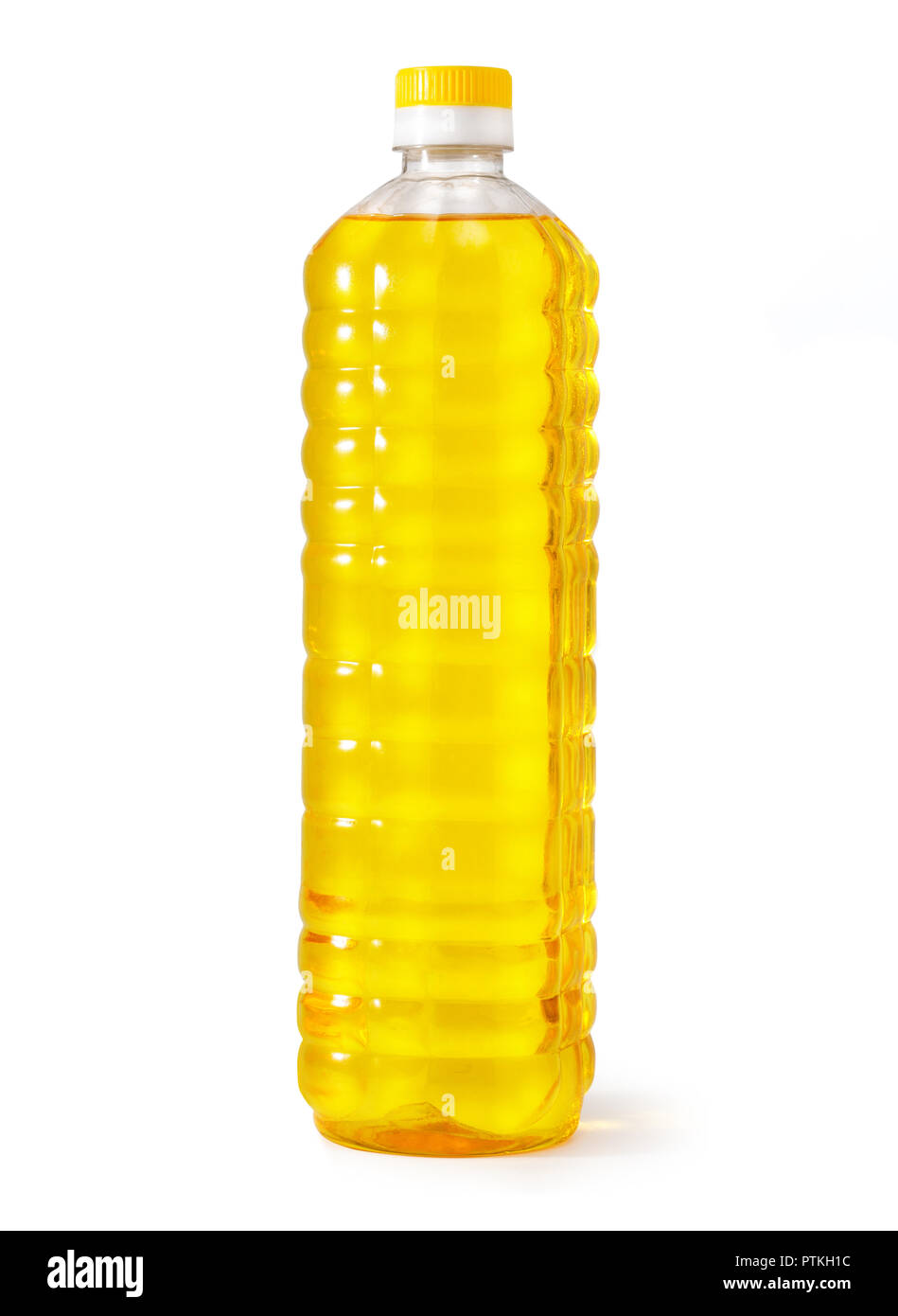 Cooking oil in a plastic bottle on a white background. File contains a ...