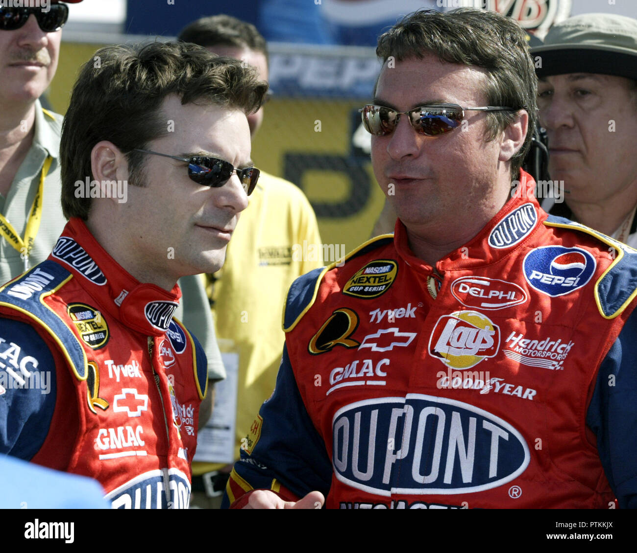 Jeff Gordon (L) talks to his crew chief Robbie Loomis, prior to the ...