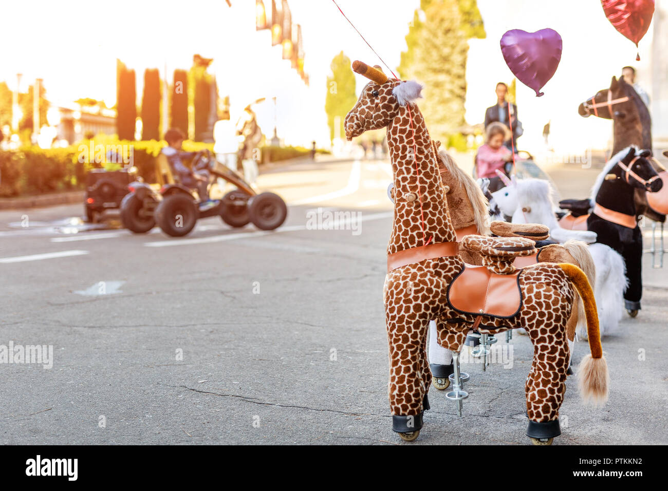 Group of large wheeled animal toys for riding. Children fun transport ...