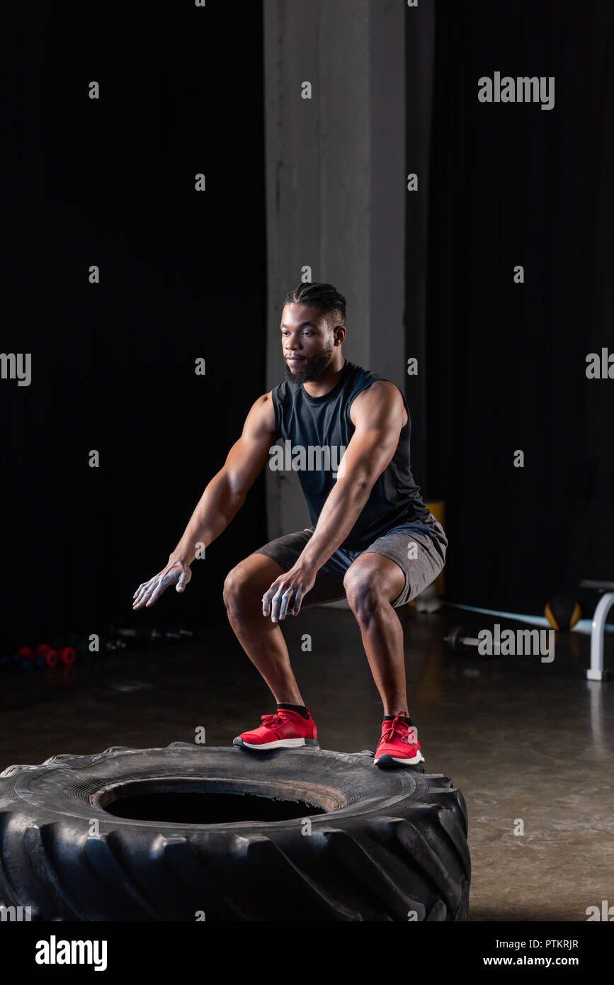 full length view of athletic african american man in sportswear ...