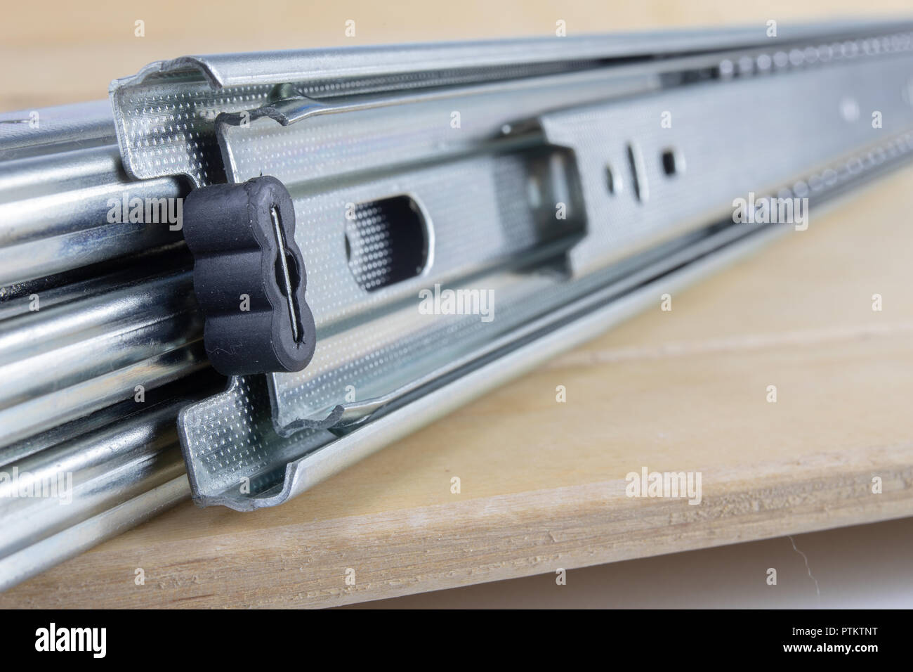 Fixing the drawer in household cabinets. Accessories for carpentry used ...