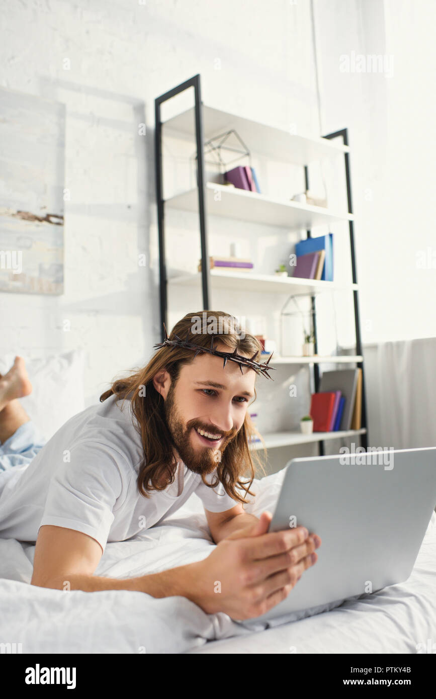Young jesus using laptop hi-res stock photography and images - Alamy