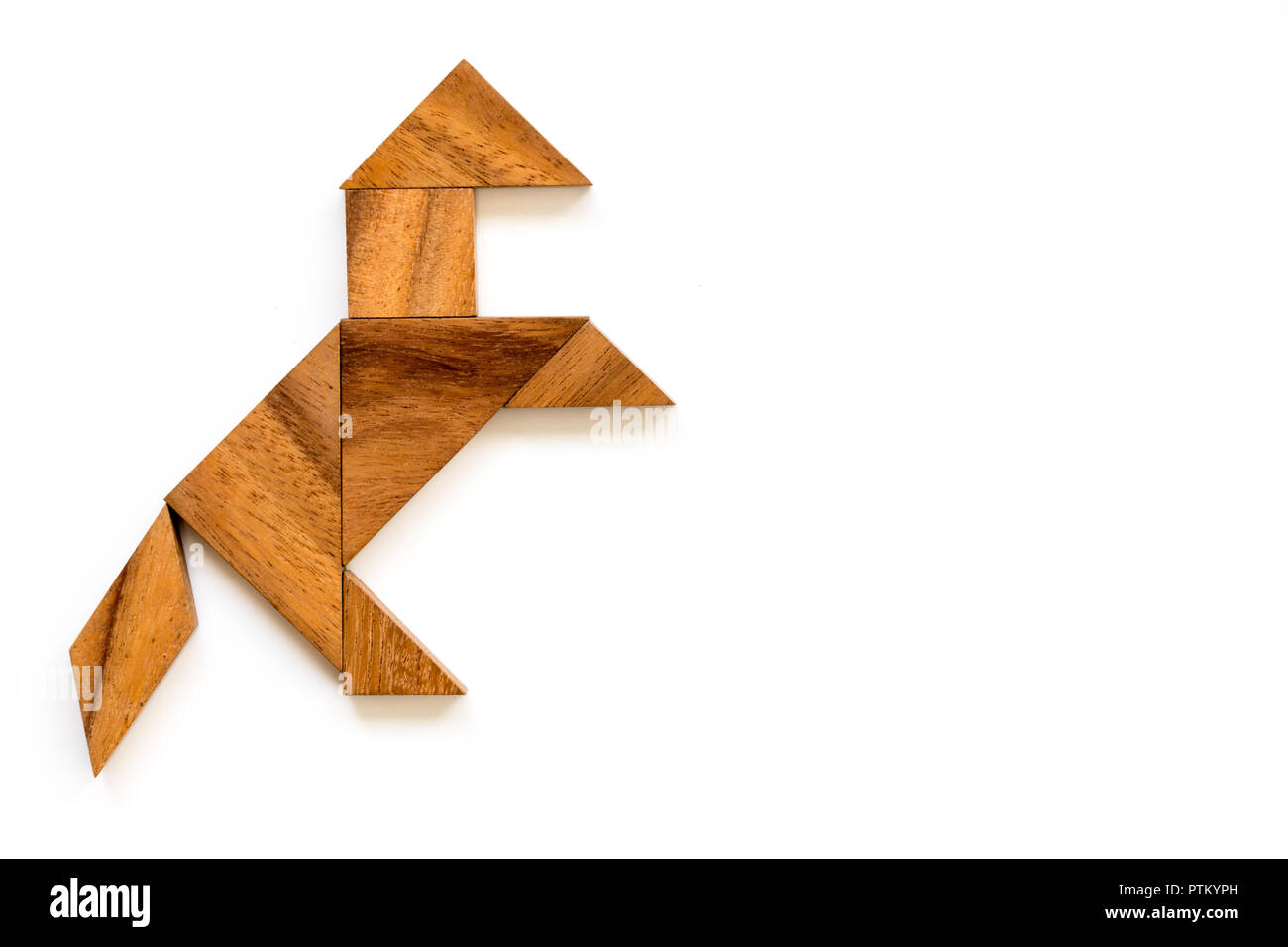 Wood tangram puzzle in horse shape on white background Stock Photo - Alamy