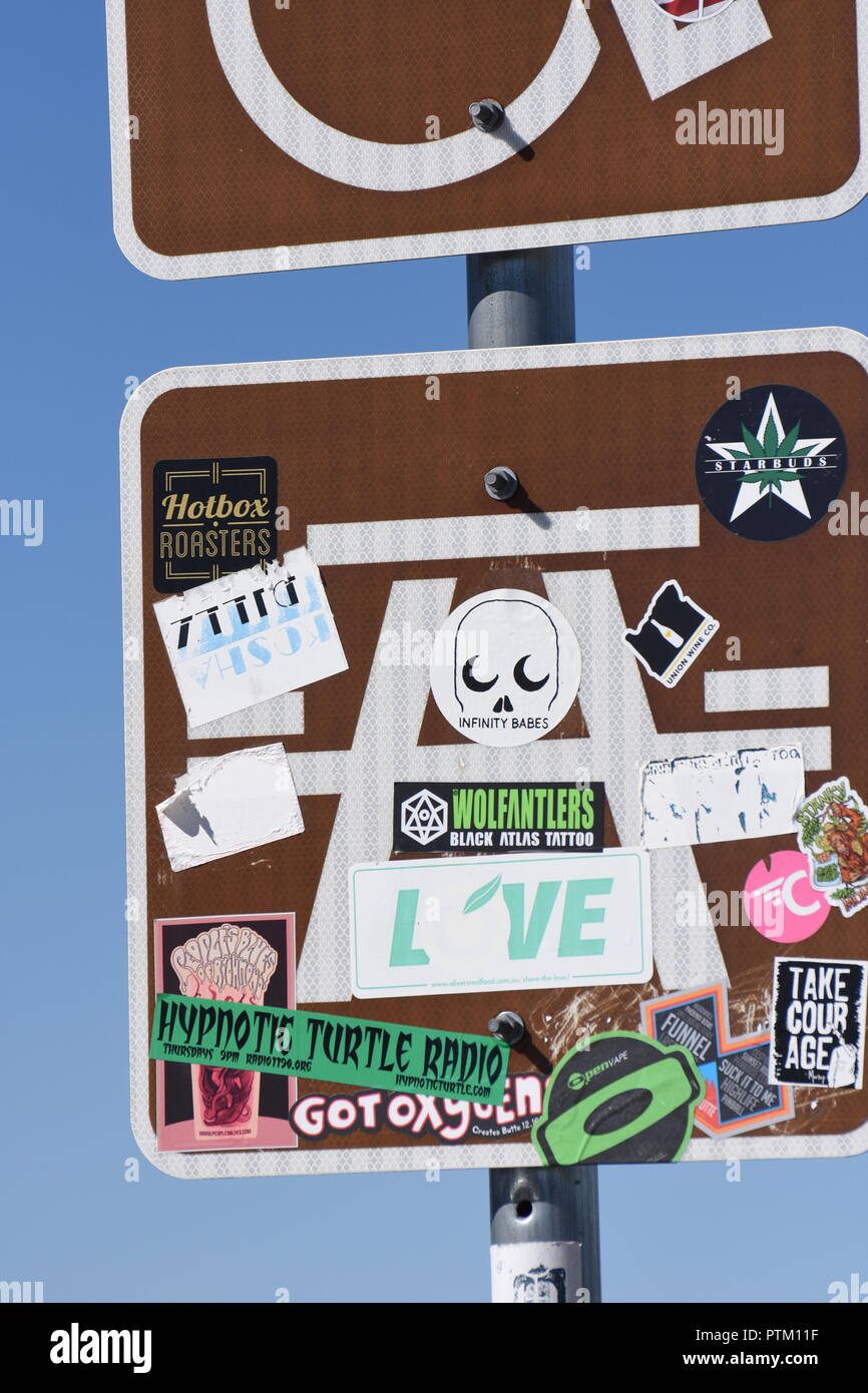 Defaced Street signs for handicapped and informational concepts with ...