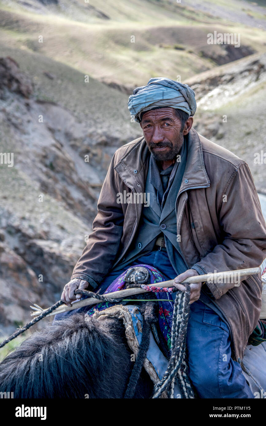 A Wakhi Man Sits Astride A Yak In The Irshad Valley In The Wakhan Corridor Of Afghanistan Stock