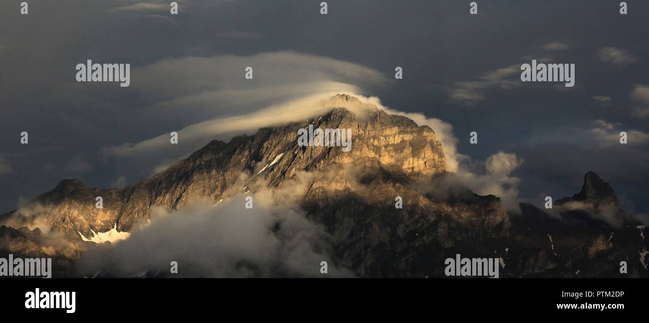 mountain and clouds in sunset light Stock Photo - Alamy
