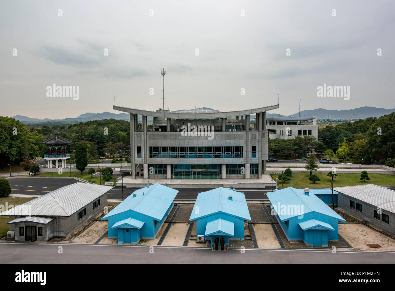 UN Army huts and South Korean Army building in background at the DMZ in ...