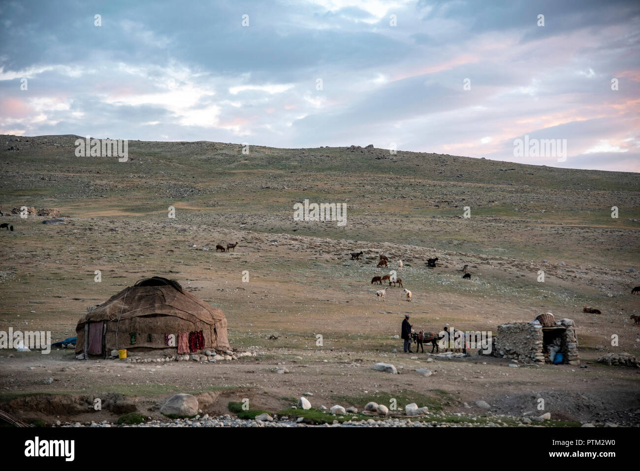 Sunset over a remote settlement in the Wakhan Corridor of Afghanistan ...