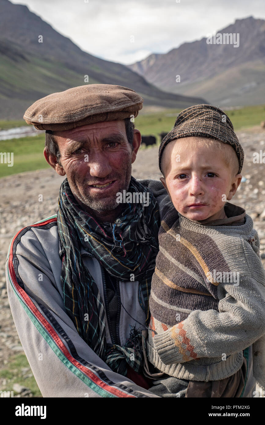 A Wakhi shepherd and his child in a remote settlement in the Wakhan ...