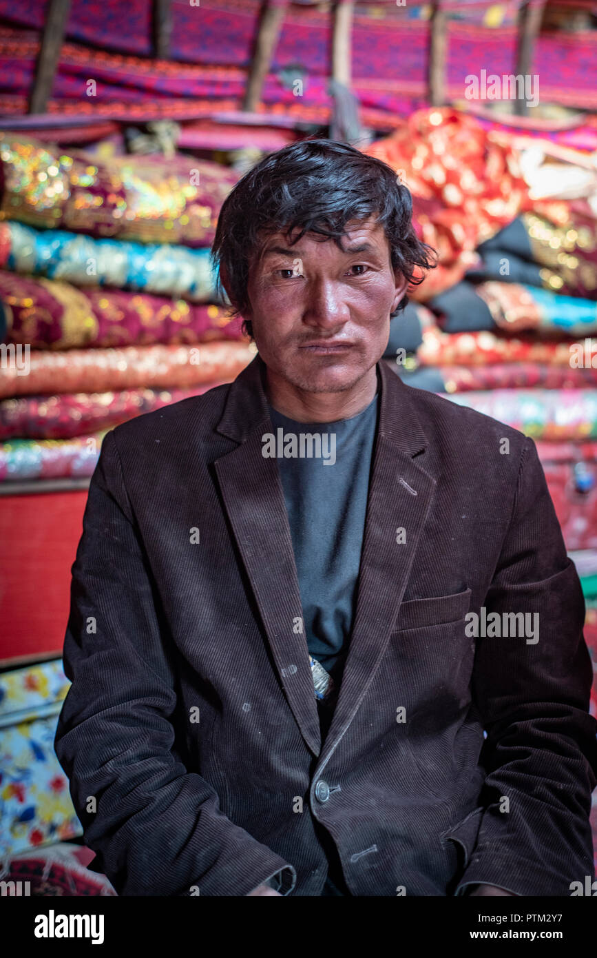 A Kyrgyz male inside a yurt in a remote settlement in the Wakhan ...
