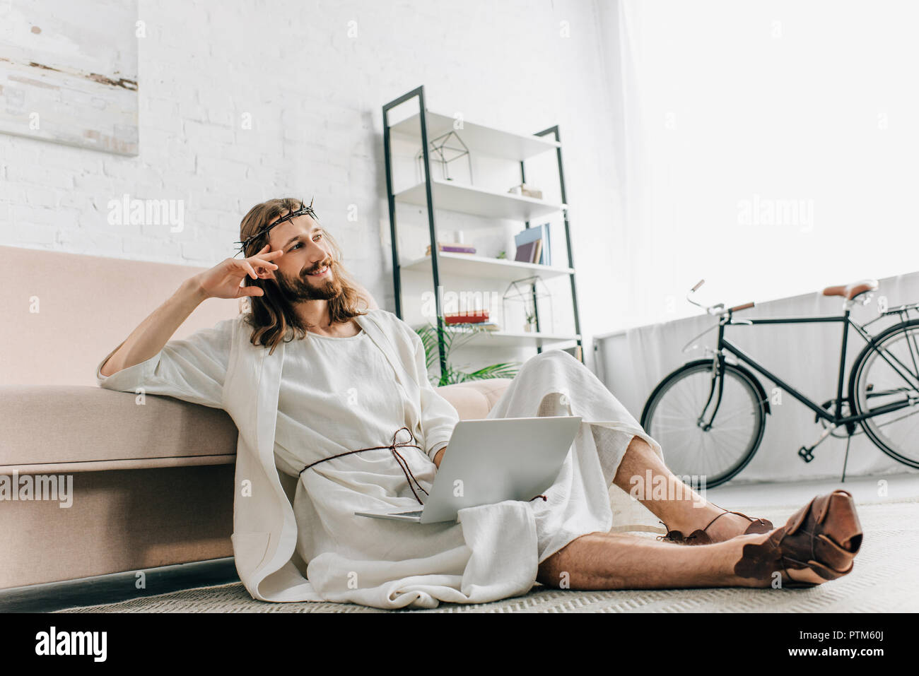 Young jesus using laptop hi-res stock photography and images - Alamy