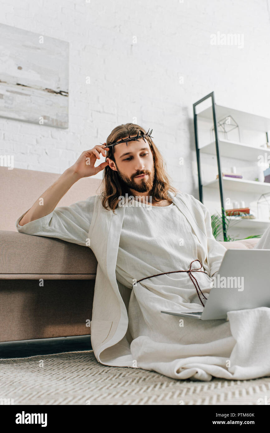 Young jesus using laptop hi-res stock photography and images - Alamy