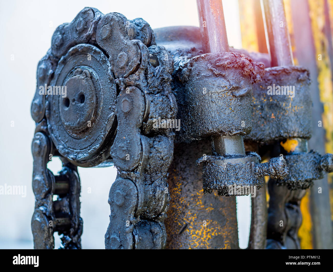 Close-up dirty and greasy chain of old forklifts with engine oil and ...
