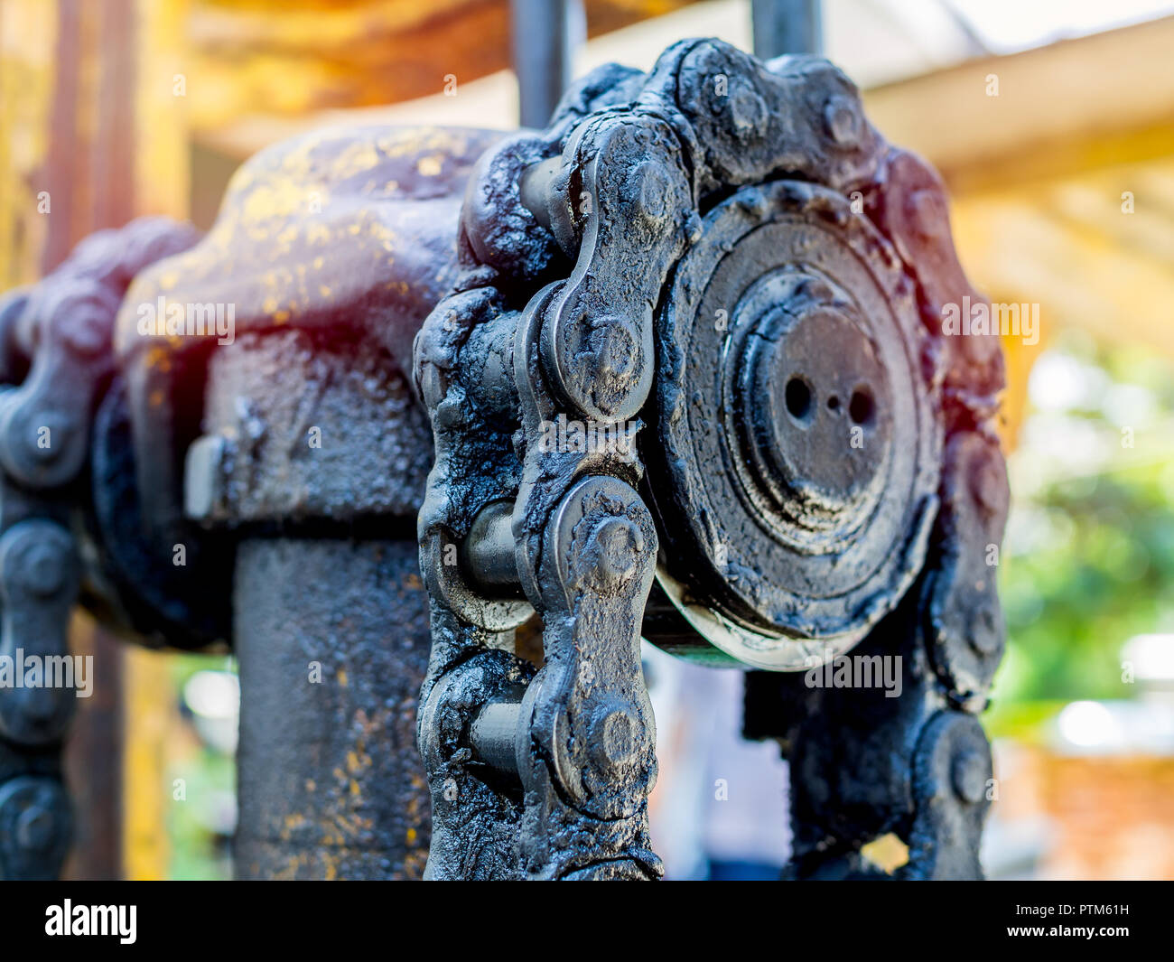 Close-up dirty and greasy chain of old forklifts with engine oil and ...
