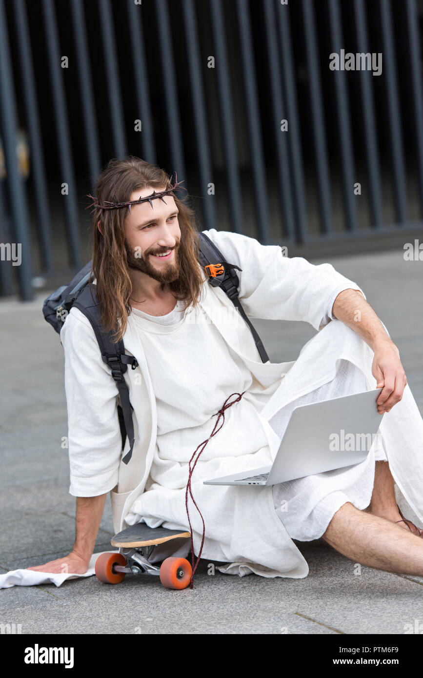 Young jesus using laptop hi-res stock photography and images - Alamy